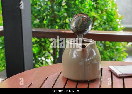 jug tea on wood floor background Stock Photo - Alamy