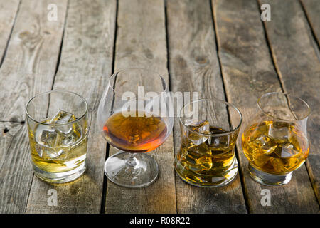 Different types of strong alcohol - bourbon, whiskey, scotch and cognac ...