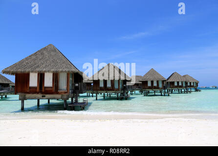 Overwater thatched roof bungalow hut of Micronesian people, lagoon of ...