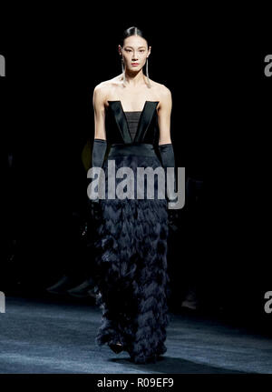 Beijing, China. 2nd Nov, 2018. A model presents a creation of the brand ...