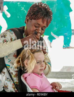 Hair braiding, Nassau, Bahamas Stock Photo - Alamy