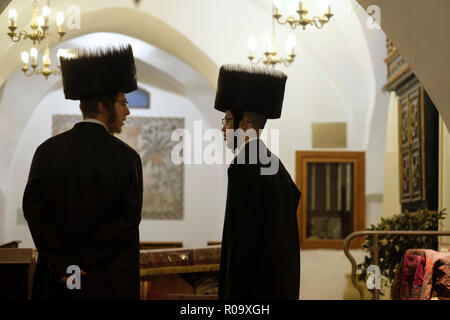 Hasidic Jews wearing a shtreimel fur hat worn by many married Haredi ...
