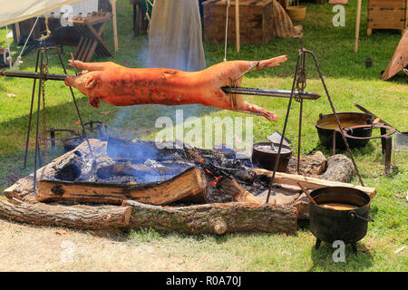 A medieval spit roast Stock Photo - Alamy