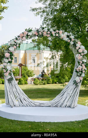 Beautiful table setting with gypsophila flowers on color wooden ...
