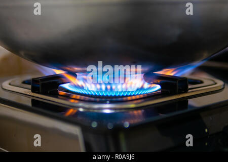 LPG Gas Burner hot blue fire flames from a stove for cooking in a ...