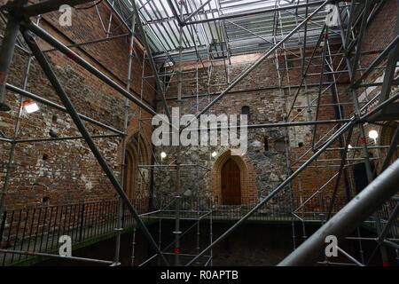 scaffolding for the construction and renovation of a medieval castle ...