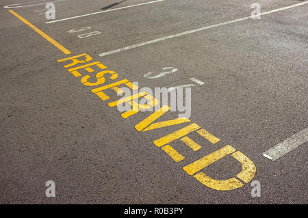 Reserved marking for reserved parking spots Stock Photo - Alamy