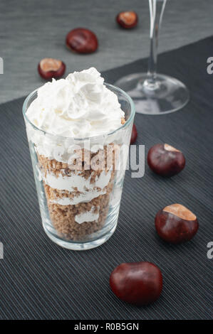 Chestnut cream with whipped cream Stock Photo - Alamy
