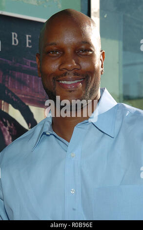 Dwayne Adway arriving at the Catwoman Premiere at the Cinerama Dome ...