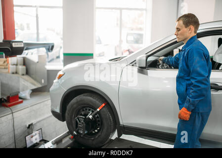 Steering wheel adjusting on collapse of convergence stand in auto ...