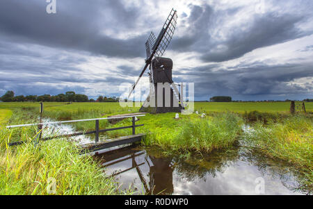 Traditional Dutch windmills from the channel Rotterdam. Holland Stock ...