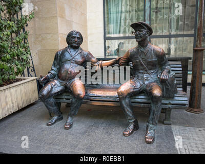 Statue of the postman and his friend in the centre of Tbilsi, Georgia ...