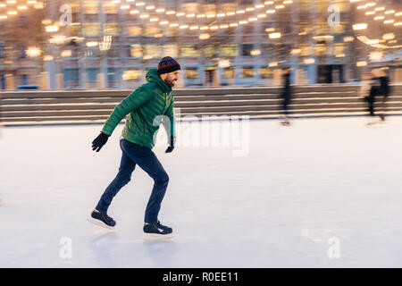 figure skates at an ice rink Stock Photo - Alamy