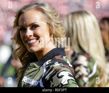 An Atlanta Falcons cheerleader performs before an NFL football game ...