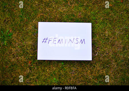 Hashtag Feminism Statement on a white sign Stock Photo - Alamy