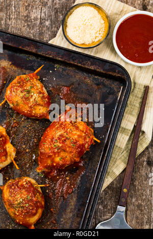 Calamari. Stuffed Squid Tubes with Tomato Sauce Stock Photo - Alamy