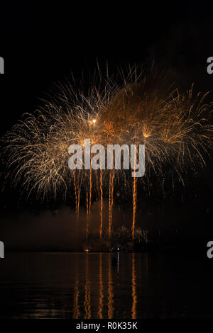 Colorful golden fireworks, glowing rain of comets and twinkling stars ...