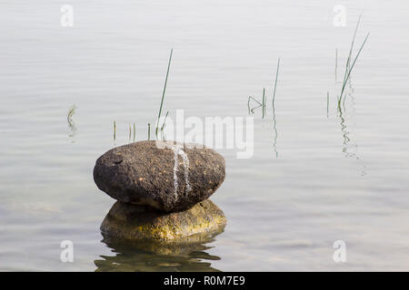 3 May 2018 Rocks piled together in flat calm shallows of the Sea Of ...