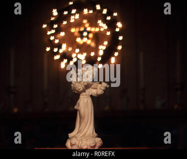 Christmas angel statue with bokeh Stock Photo - Alamy