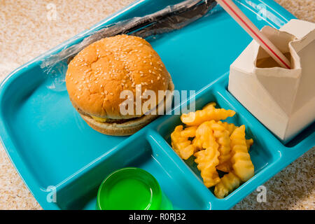 Elementary school lunch cheeseburger with ripple cut french fries ...
