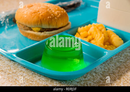 Elementary school lunch cheeseburger with ripple cut french fries ...