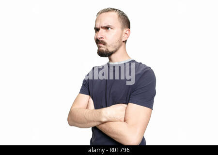 Sertious business man standing isolated on white studio background ...