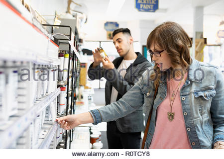 Young men and women shopping Stock Photo - Alamy