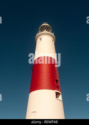 white and red large lighthouse isle of portland weymouth building ...