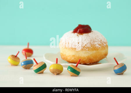Banner of jewish holiday Hanukkah with wooden dreidels (spinning top ...