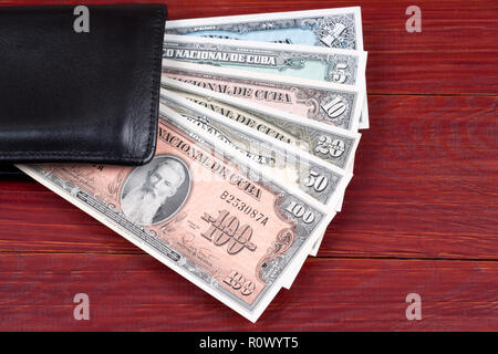 Old Cuban Pesos in the black wallet Stock Photo - Alamy