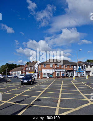 yellow traffic boxes at Junction intersection of kings drive B5171 and ...