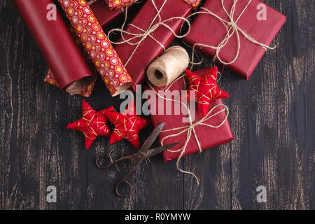 pile of gifts on the old table Stock Photo - Alamy