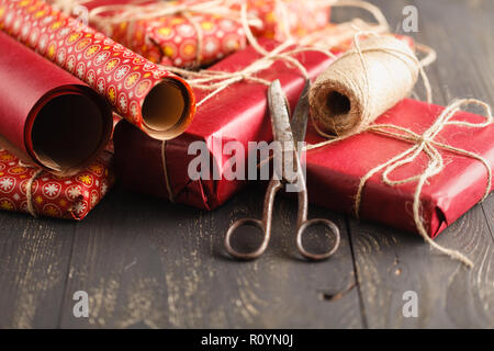 pile of gifts on the old table Stock Photo - Alamy