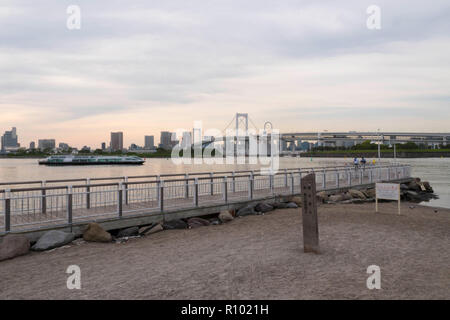 People walk on a pier at Odaiba Seaside park in Tokyo, Japan Stock ...