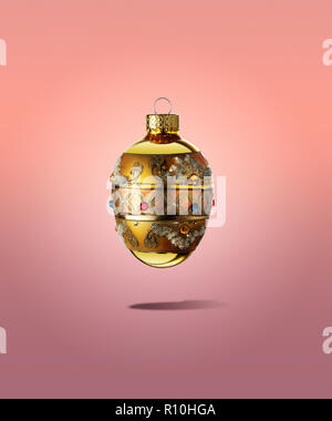 Beautiful christmas bauble close up on a dark red background Stock ...