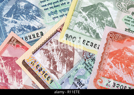 Nepalese money - rupee a business background Stock Photo - Alamy
