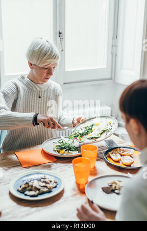 Girlfriends having lunch Stock Photo - Alamy