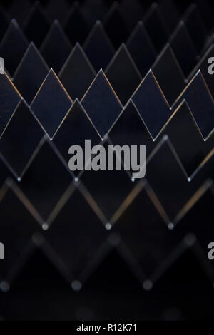 Detail of the sheet metal spikes backdrop Stock Photo - Alamy