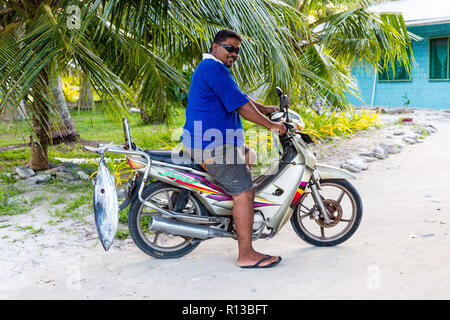 A Tuna fisherman on Funafuti, tuvalu and a pole and line caught Tuna ...