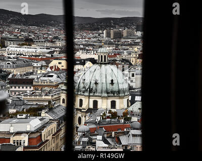 An aerial view behind of window cityscape surrounded by buildings in ...