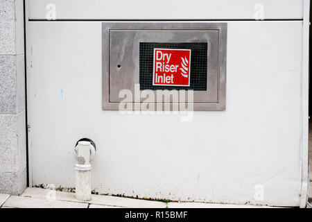 A Dry Riser Inlet sign on a door, UK Stock Photo - Alamy
