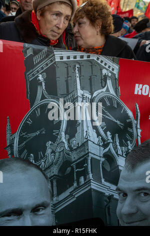Russian Communist supporters gather with red flags on Red Square in ...