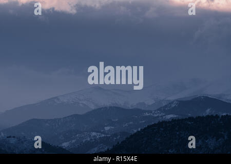 Dramatic winter storm blows over a cold barren landscape Stock Photo ...