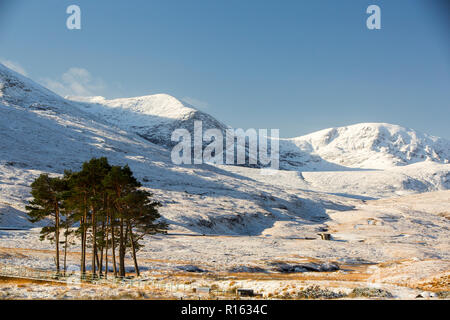 The Fannichs covered in fresh snow near Ullapool, Scotland, UK from the ...