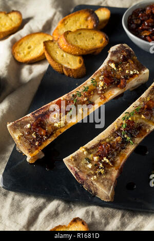 Homemade roasted beef bone marrow with garlic bread, closeup Stock ...