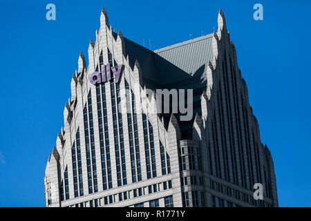 A logo sign outside of the Ally Detroit Center, the headquarters of ...