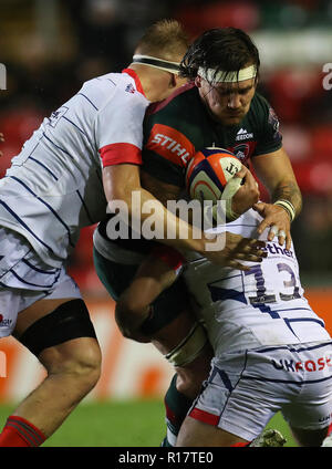Leicester Tigers' James Thompson is tackled by Exeter Chiefs' Immanuel ...