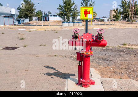 red hydrant on the airport runway, windhoek airport, Hosea Kutako ...
