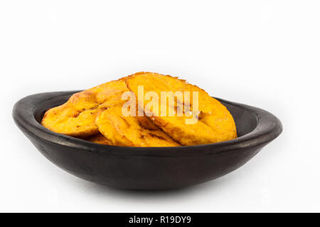 Fried half ripe plantain slices isolated on white background Stock ...