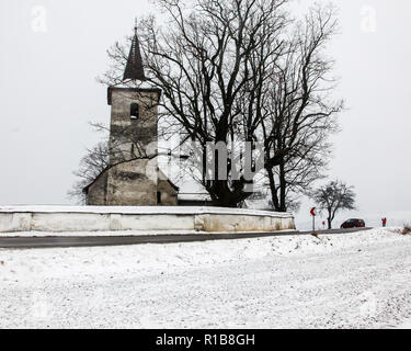 Old gothic church in Ludrova village near Ruzomberok, Slovakia. Black ...